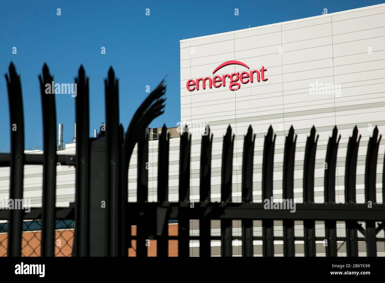A logo sign outside of a facility occupied by Emergent BioSolutions in ...