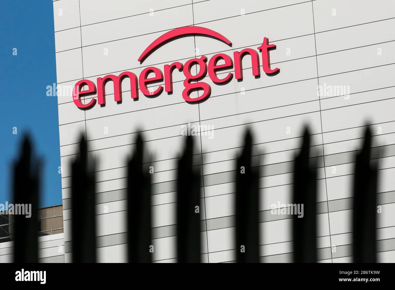 A logo sign outside of a facility occupied by Emergent BioSolutions in ...
