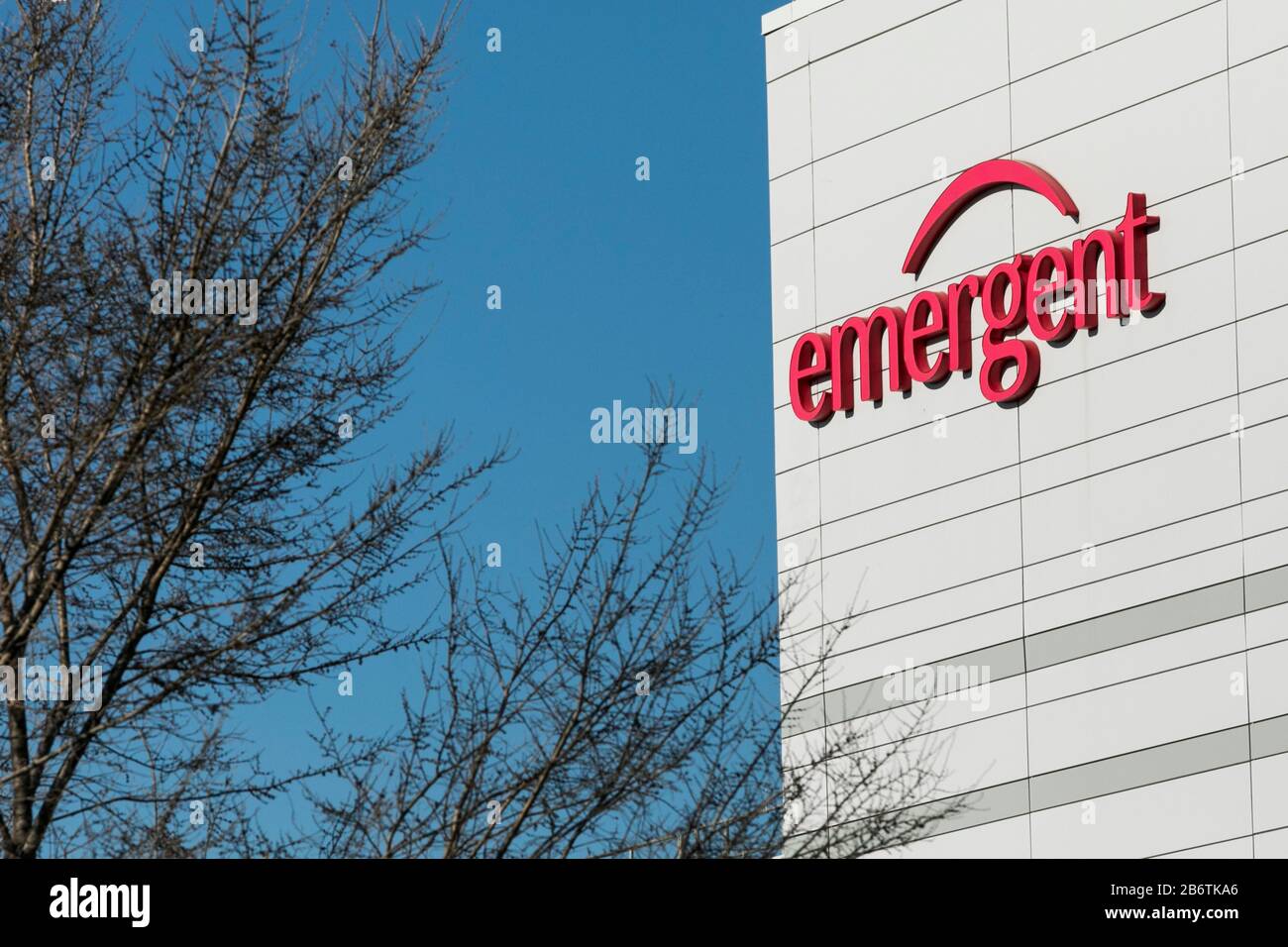 A logo sign outside of a facility occupied by Emergent BioSolutions in ...
