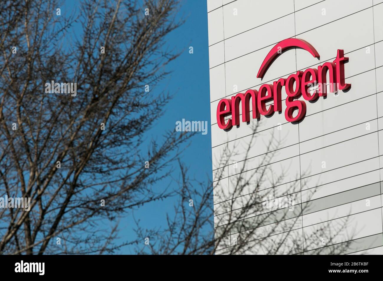 A logo sign outside of a facility occupied by Emergent BioSolutions in ...