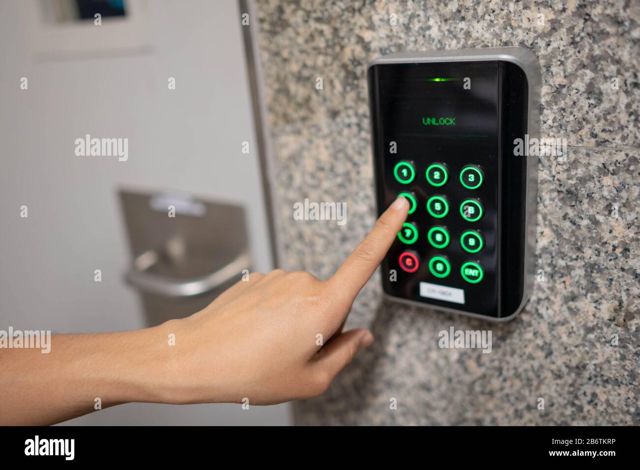 The security system pressing keys on keypad on the door at the Bangkok ... The security system pressing keys on keypad on the door at the Bangkok ...