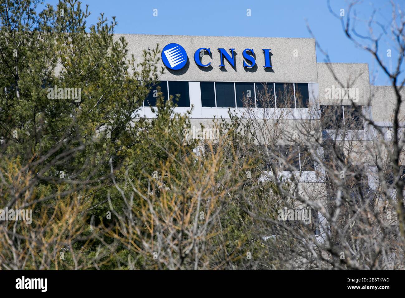 A logo sign outside of the headquarters of CNSI in Rockville, Maryland ...