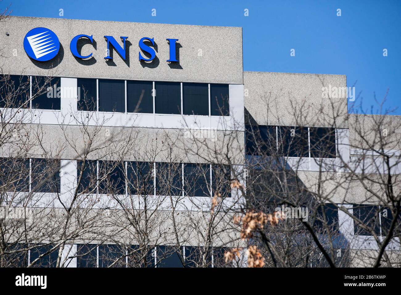 A logo sign outside of the headquarters of CNSI in Rockville, Maryland ...