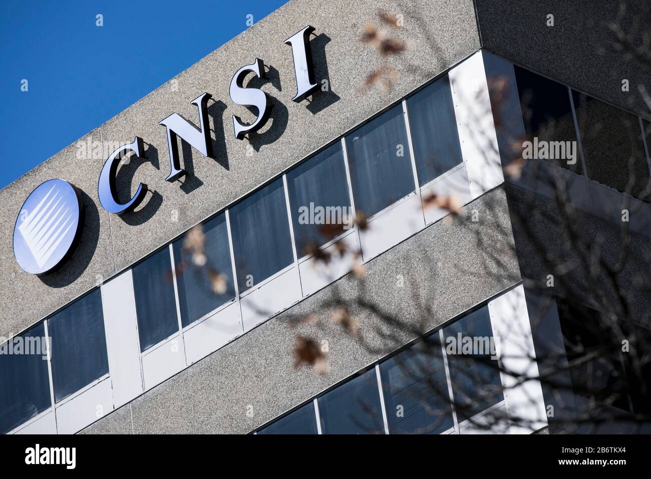 A logo sign outside of the headquarters of CNSI in Rockville, Maryland ...