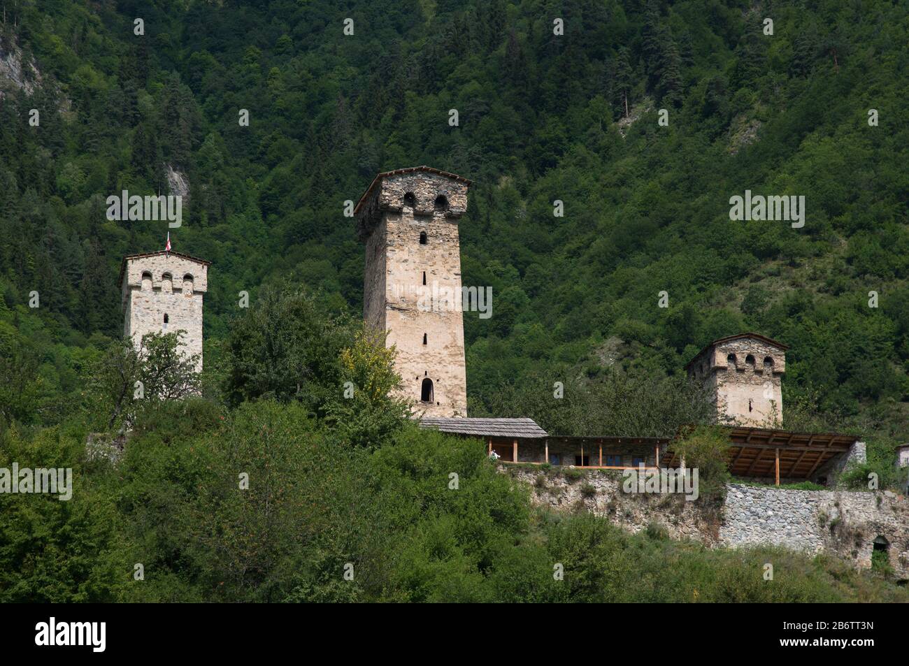 Traditional Svaneti towers against green mountain background Stock ...
