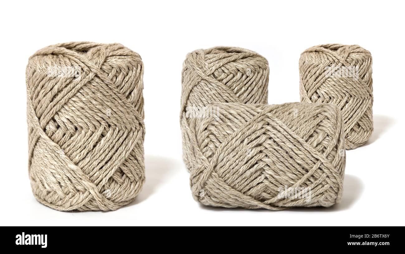 Ball of brown yarn on white background Stock Photo - Alamy