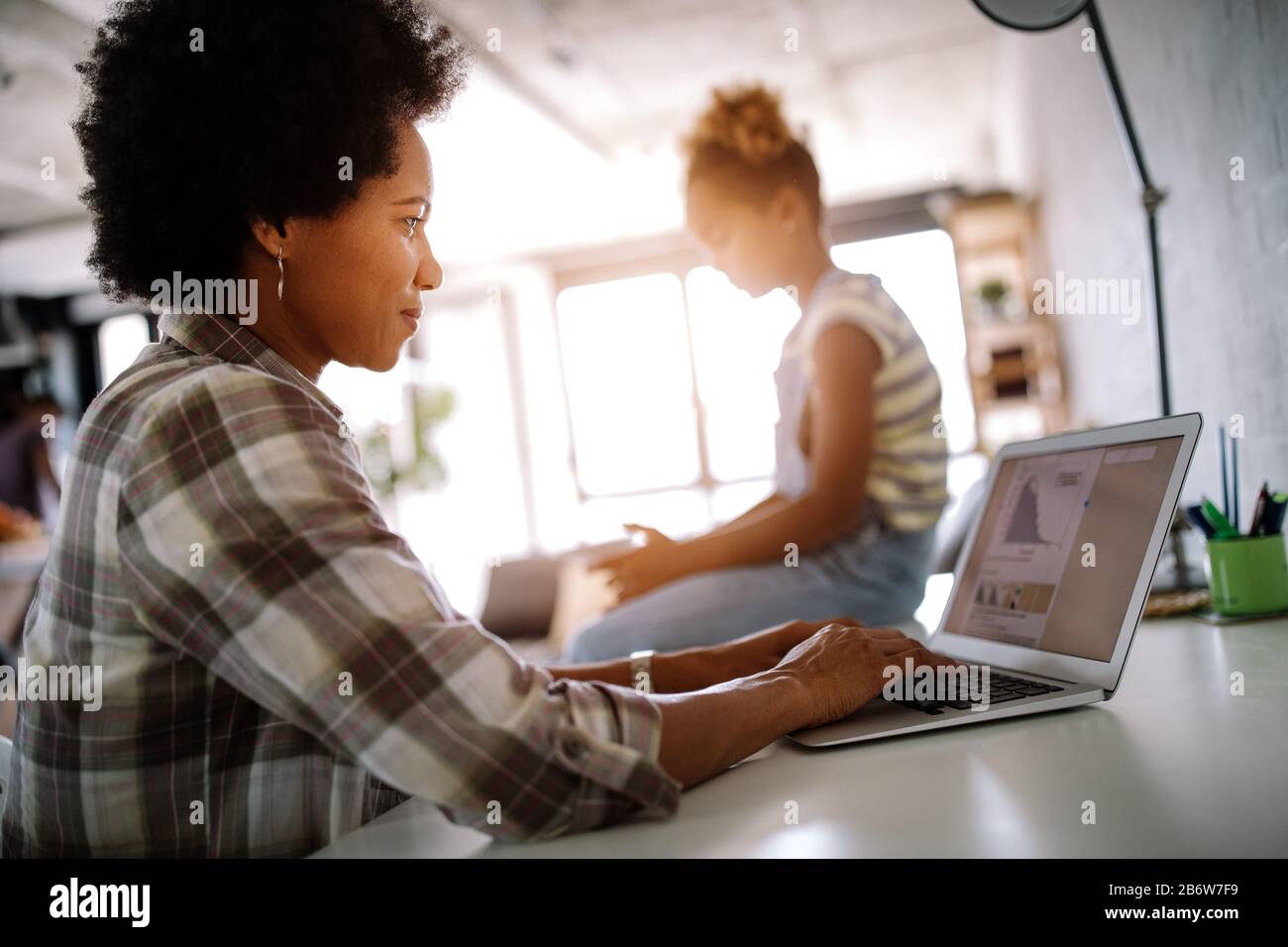 Busy parents and ignoring daughter hi-res stock photography and images ...