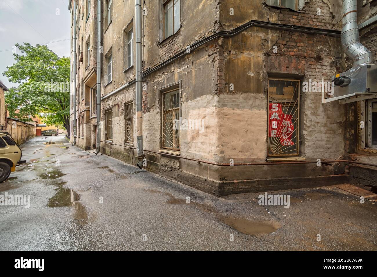 Old rusty neglected brick city residential building entrance living ...