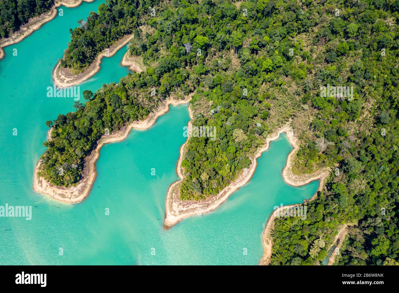 Aerial view looking downwards onto tiny islands and fingers of tropical ...