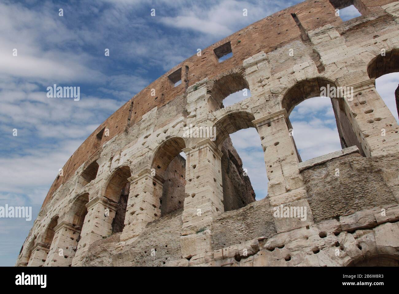 The exterior facade of the Colosseum or Coliseum with the arches ...
