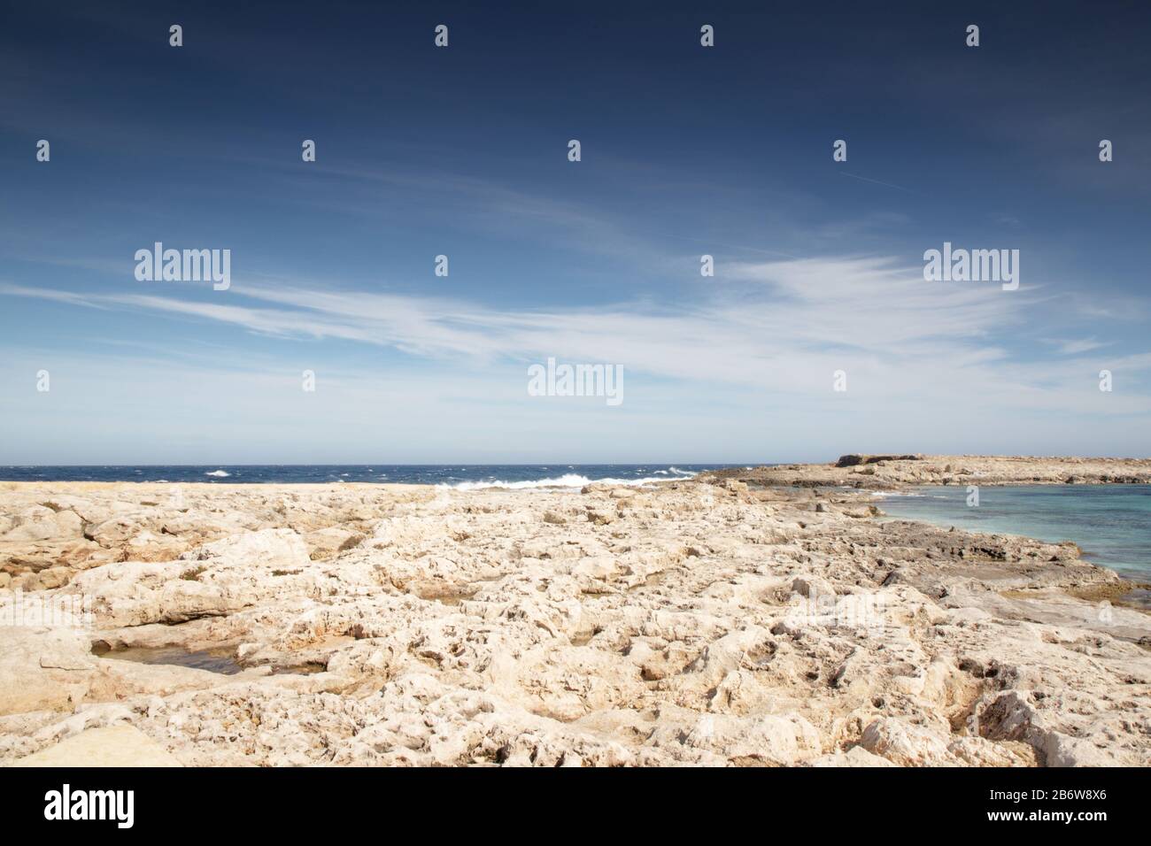 stoney beach Seascape image near Qawra Point Beach in Malta Stock Photo ...