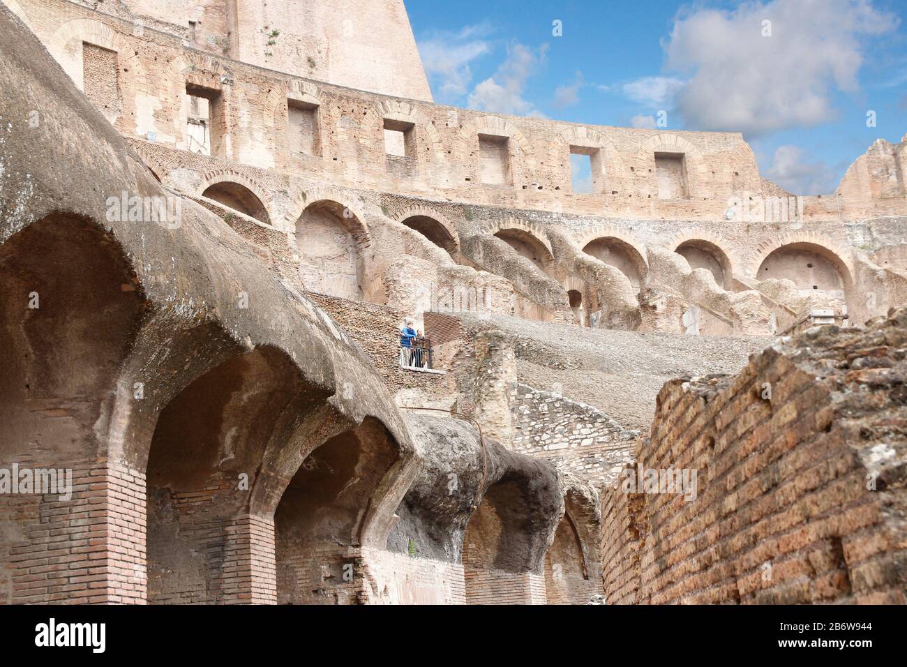 Interior of the Colosseum or Coliseum with the bricks wall and arches ...