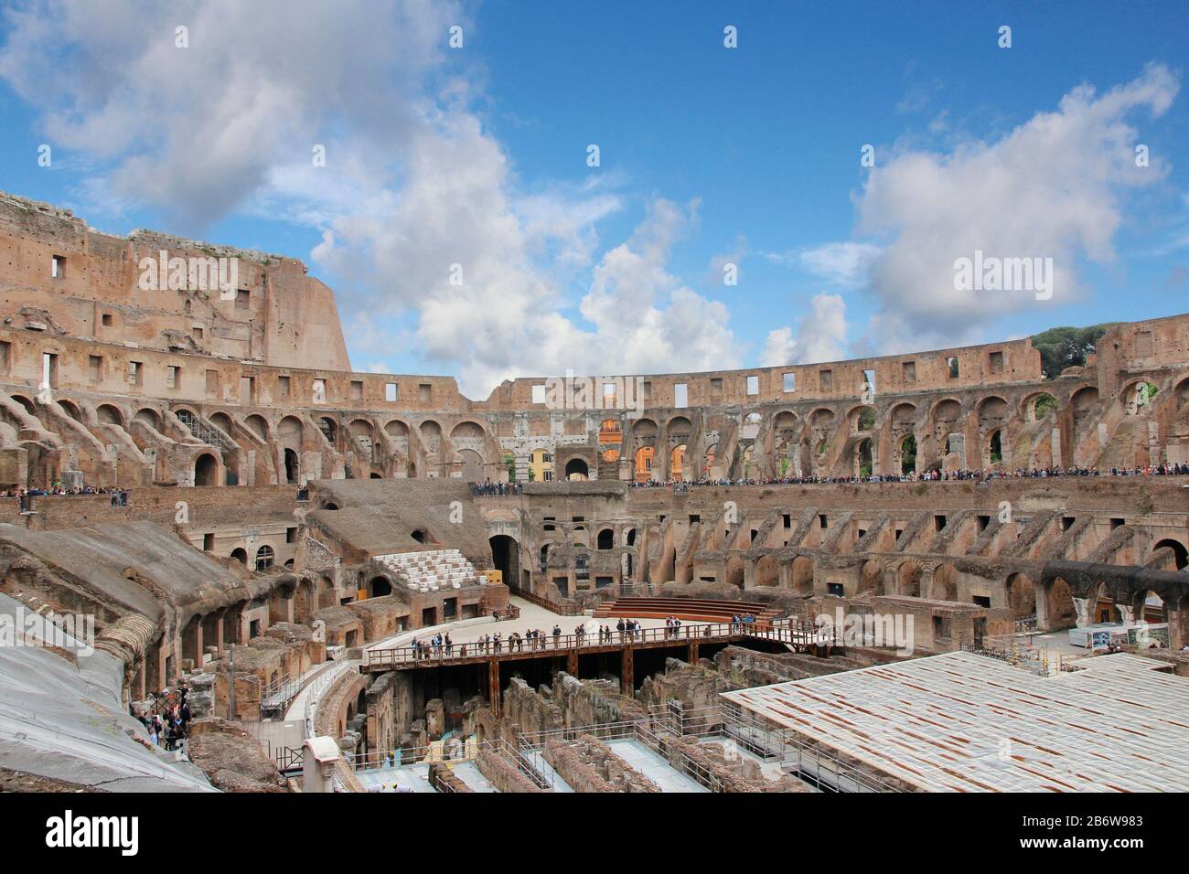Interior of the Colosseum or Coliseum with the bricks wall and arches ...