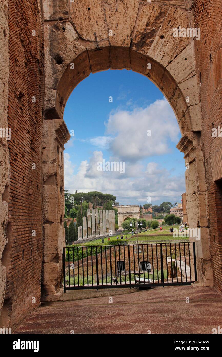 Interior of the Colosseum or Coliseum with the bricks wall and arches ...