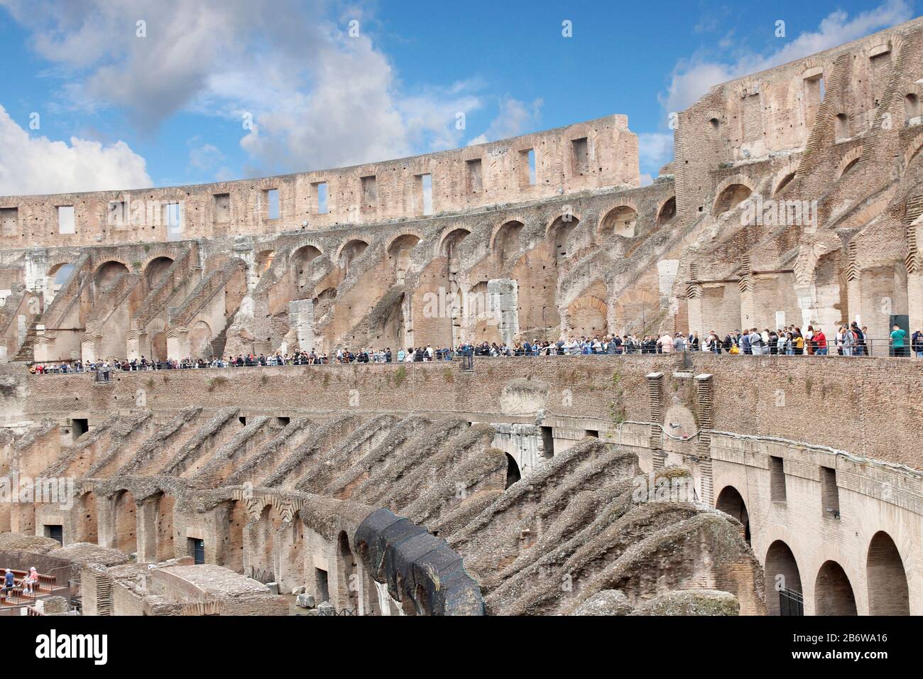 Interior of the Colosseum or Coliseum with the bricks wall and arches ...