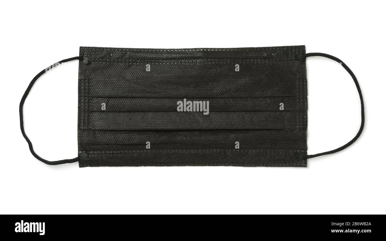 Front view of black disposable medical face mask isolated on white ...