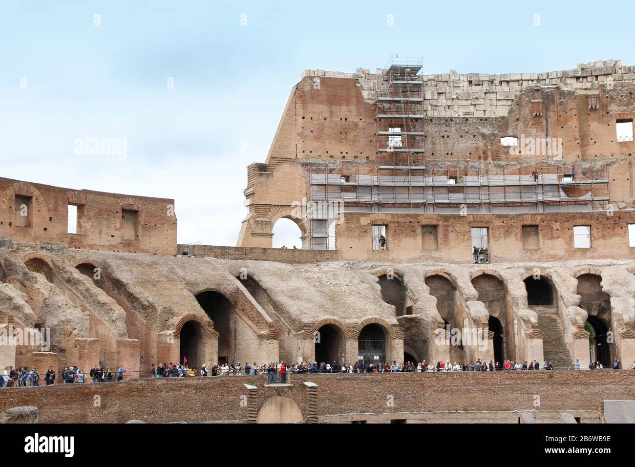 Interior of the Colosseum or Coliseum with the bricks wall and arches ...