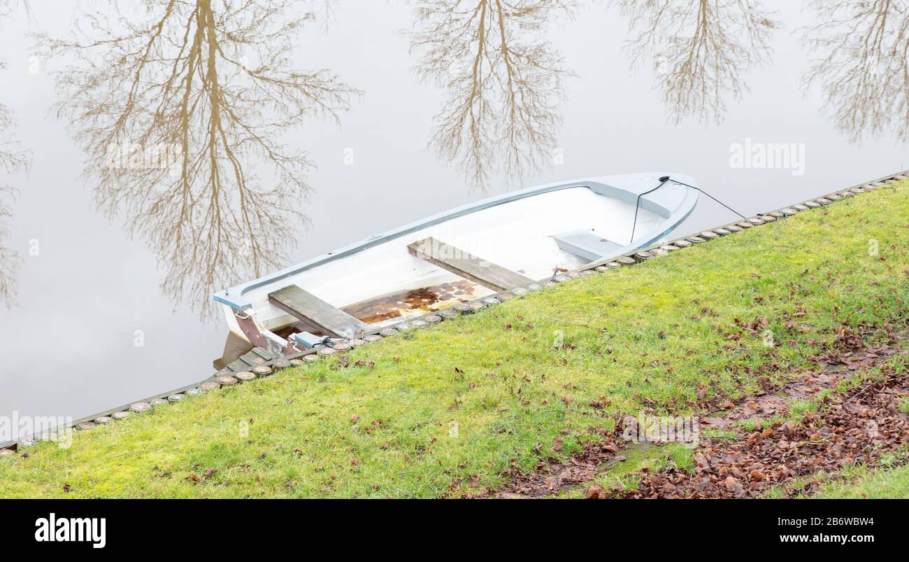 Small boat in the water, Friesland, the Netherlands Stock Photo - Alamy