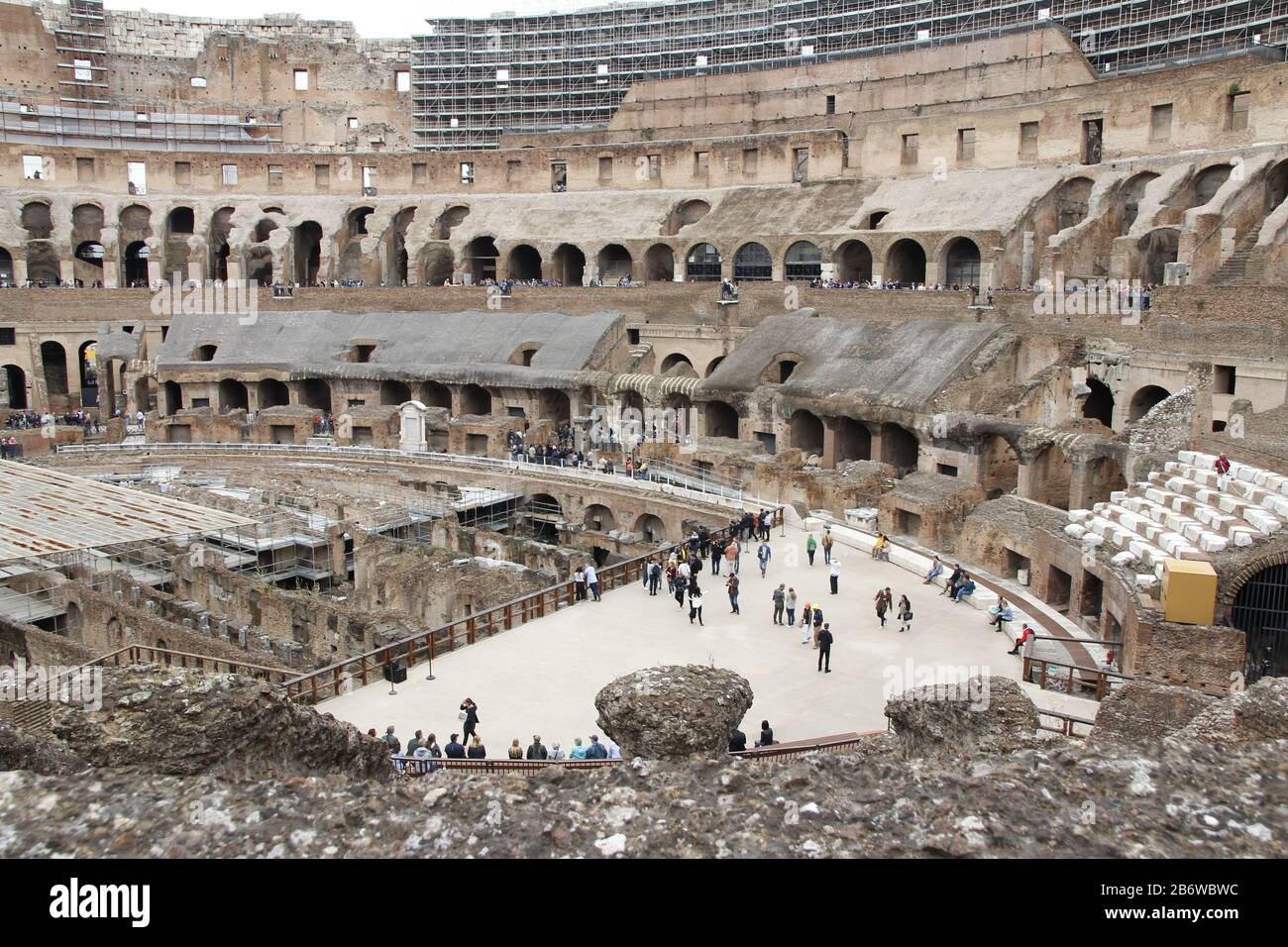 Interior of the Colosseum or Coliseum with the bricks wall and arches ...