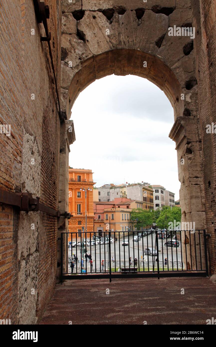 Interior of the Colosseum or Coliseum with the bricks wall and arches ...