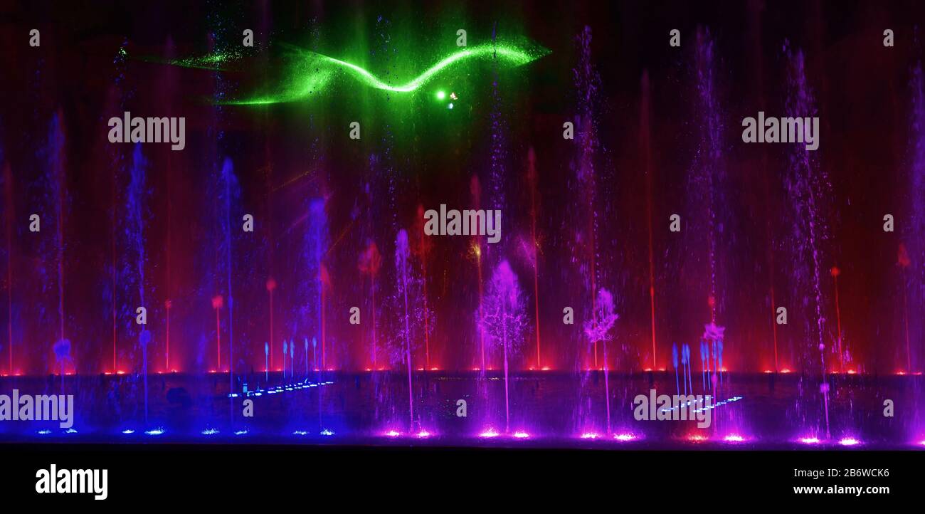 Colorful water fountains. Beautiful laser and fountain show. Large ...