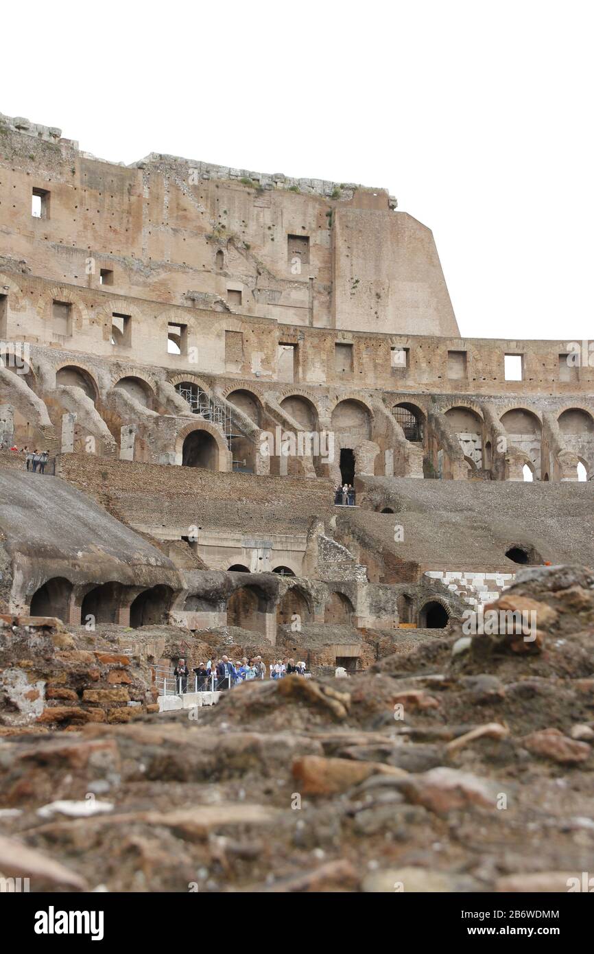 Interior of the Colosseum or Coliseum with the bricks wall and arches ...