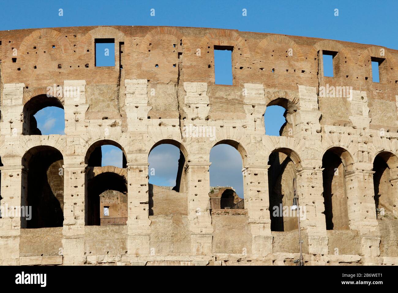 The exterior facade of the Colosseum or Coliseum with the arches ...