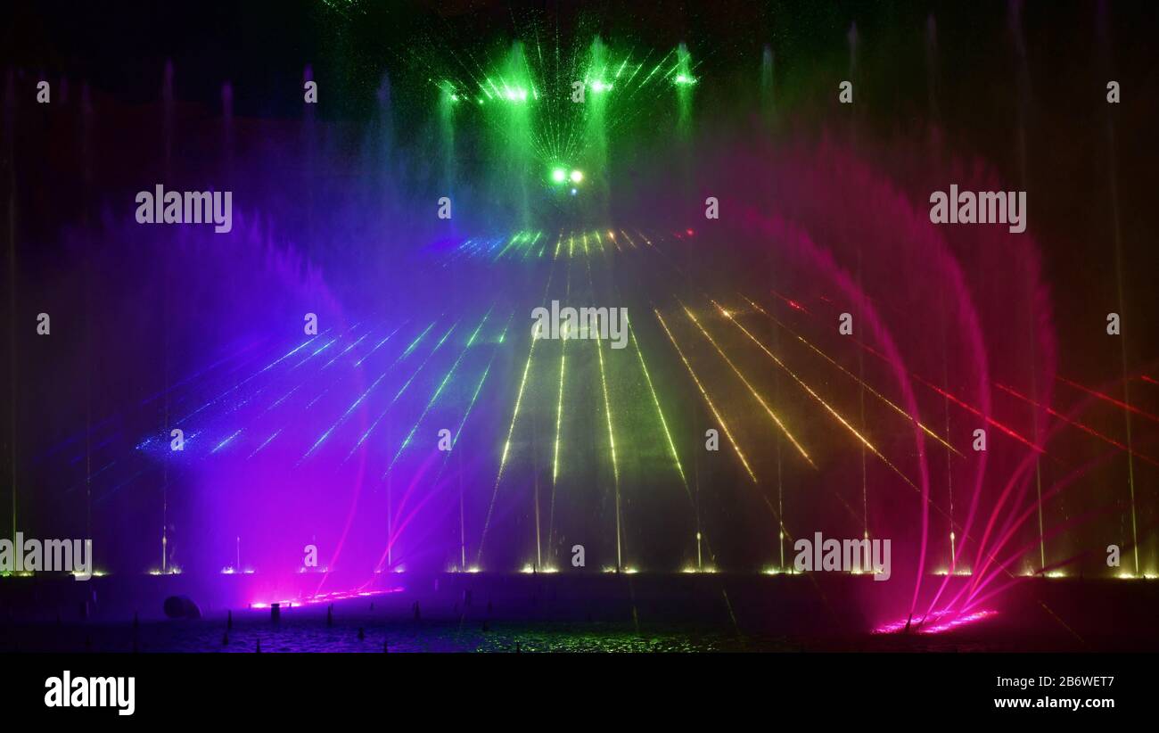 Colorful water fountains. Beautiful laser and fountains show. Large ...