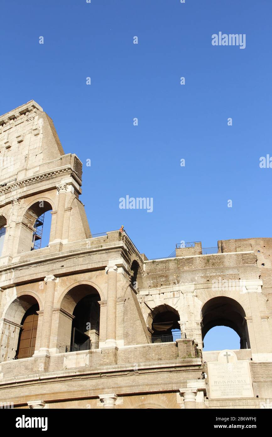 The exterior facade of the Colosseum or Coliseum with the arches ...