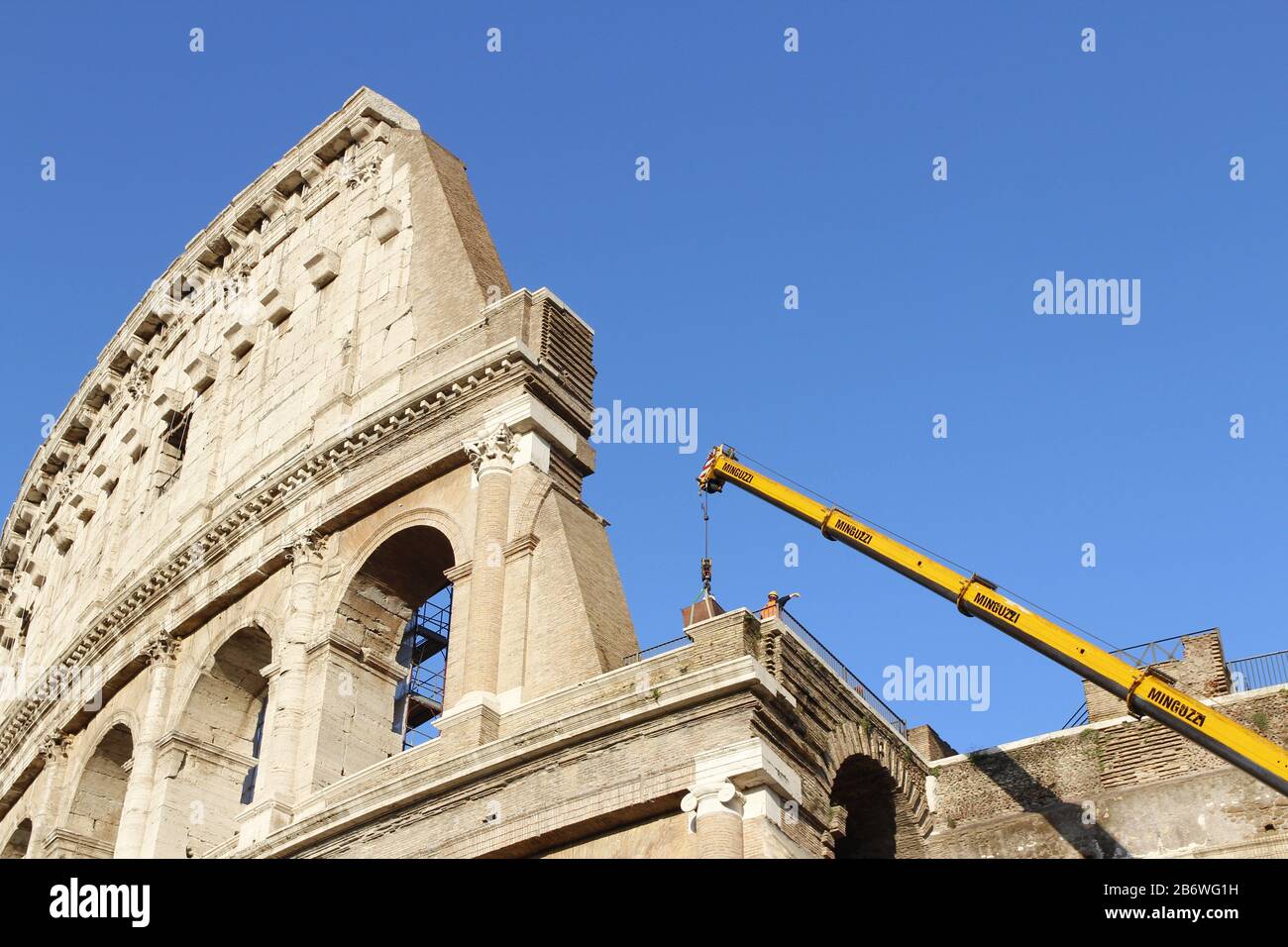 The exterior facade of the Colosseum or Coliseum with the arches ...