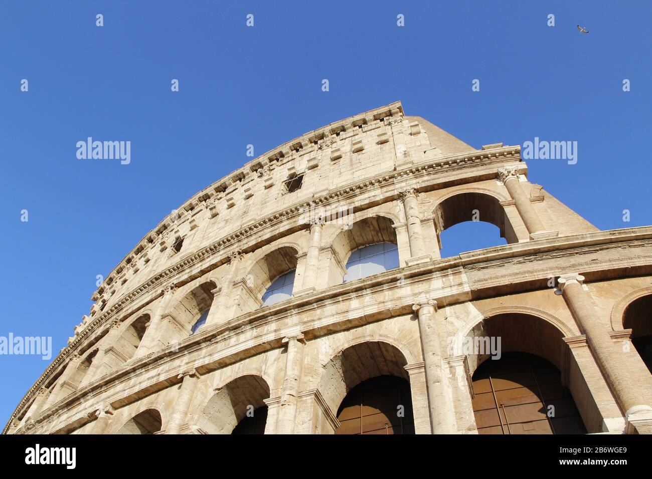 The exterior facade of the Colosseum or Coliseum with the arches ...