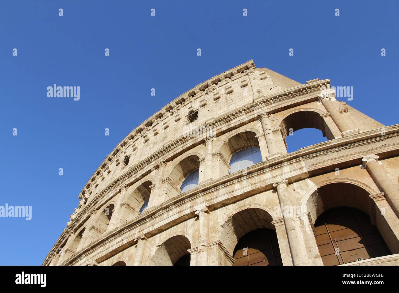 The exterior facade of the Colosseum or Coliseum with the arches ...