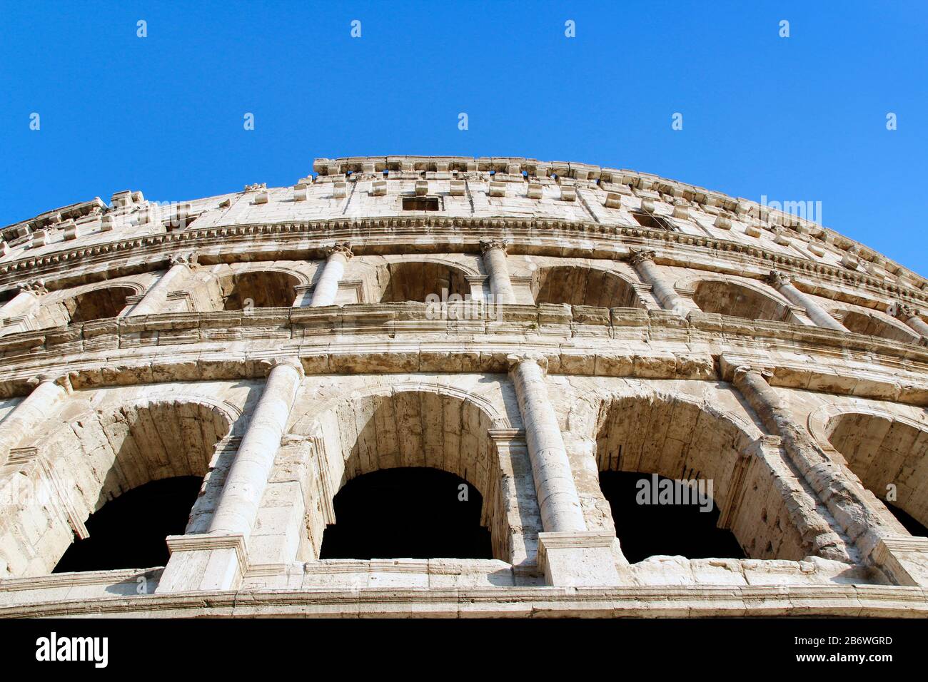 The exterior facade of the Colosseum or Coliseum with the arches ...