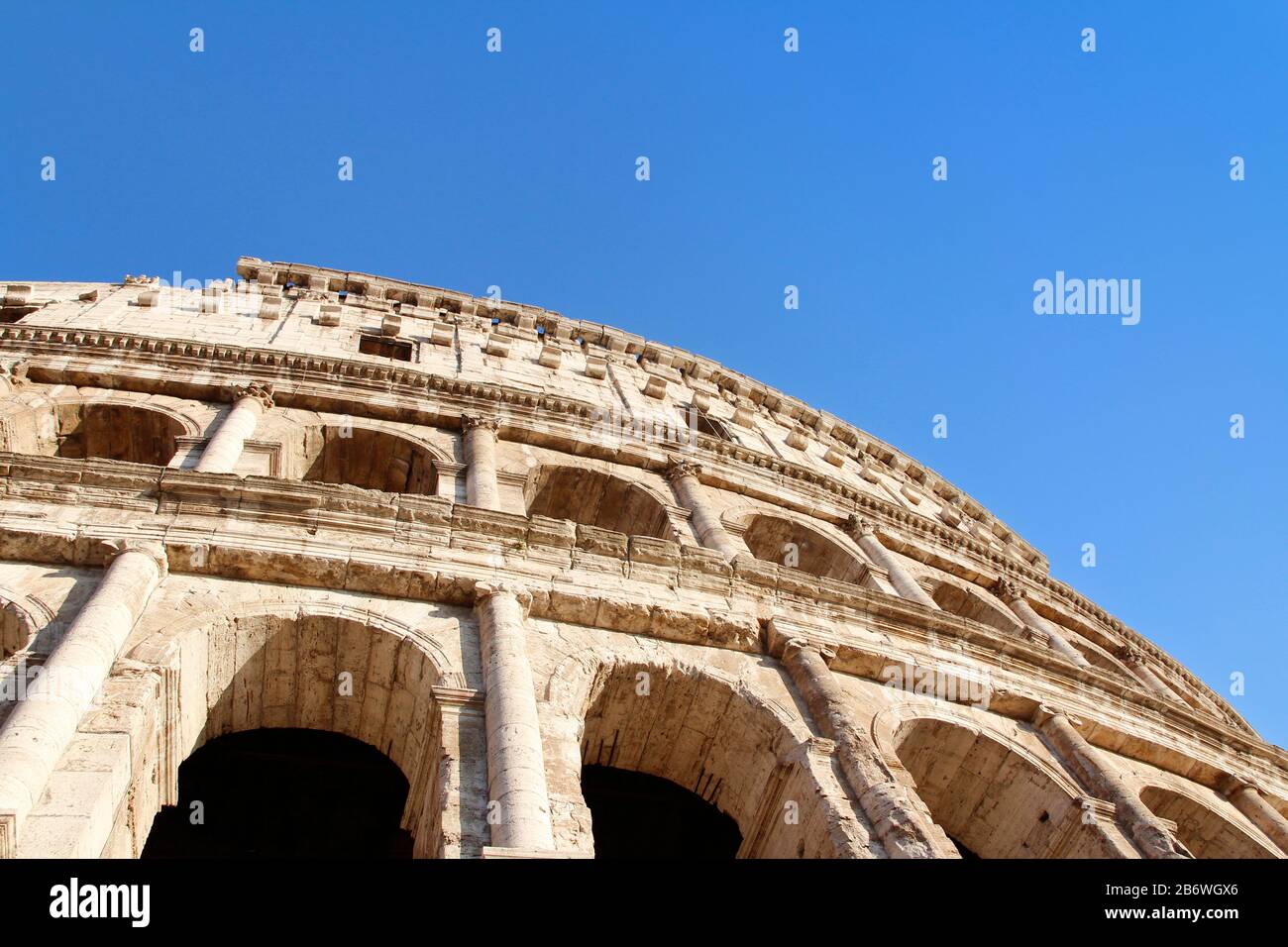 The exterior facade of the Colosseum or Coliseum with the arches ...