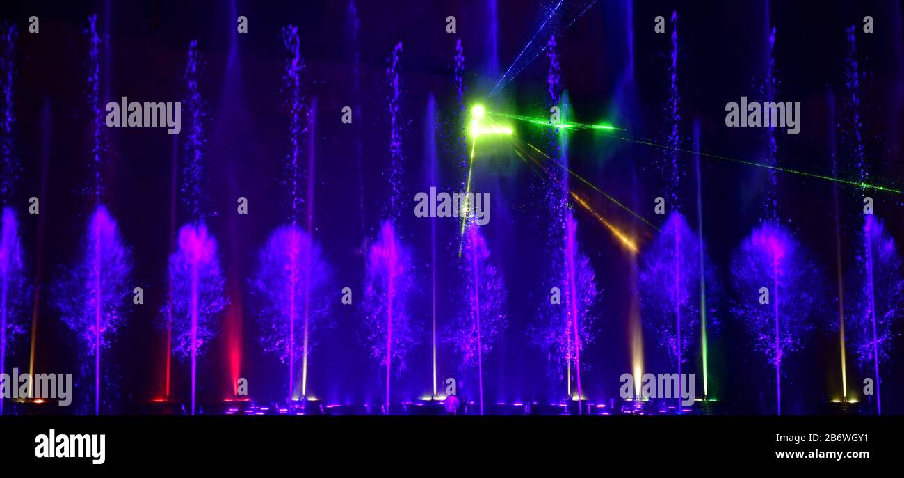 Colorful water fountains. Beautiful laser and fountains show. Large ...