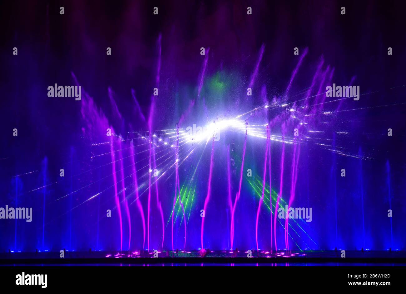 Colorful water fountains. Beautiful laser and fountains show. Large ...
