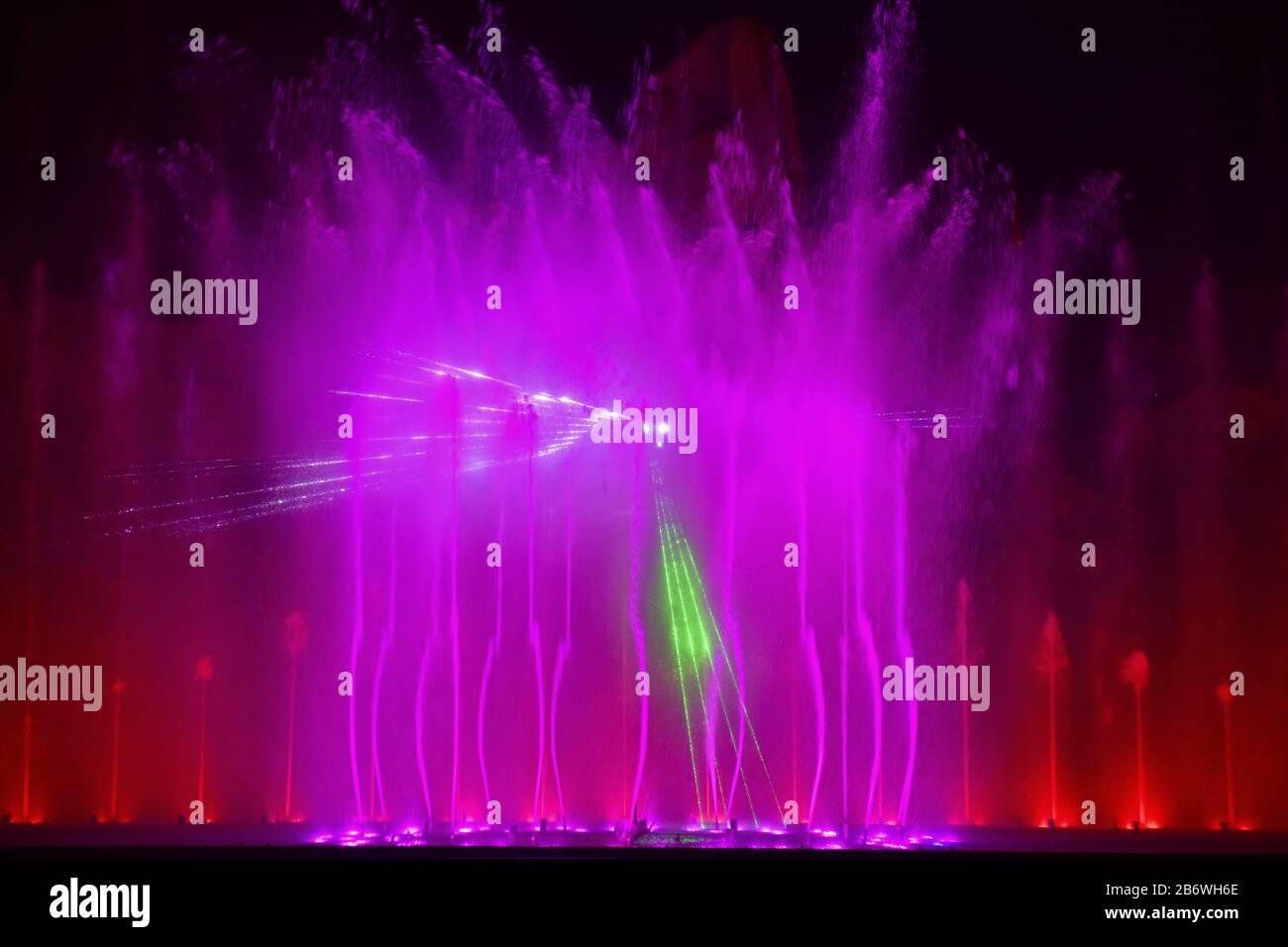Colorful water fountains. Beautiful laser and fountains show. Large ...