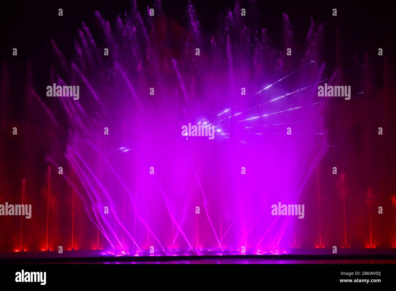 Colorful water fountains. Beautiful laser and fountains show. Large ...