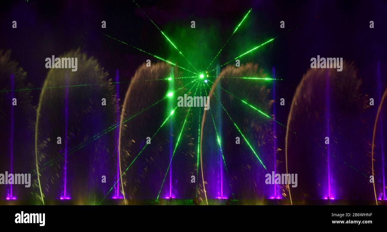 Colorful water fountains. Beautiful laser and fountains show. Large ...