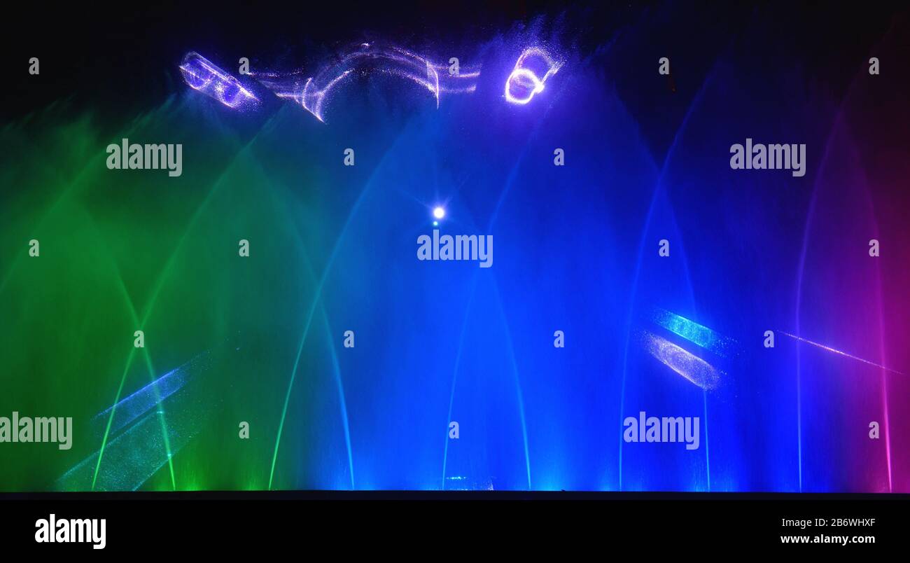 Colorful water fountains. Beautiful laser and fountains show. Large ...
