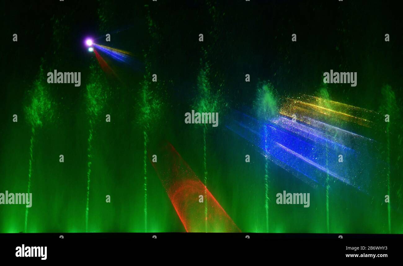 Colorful water fountains. Beautiful laser and fountains show. Large ...