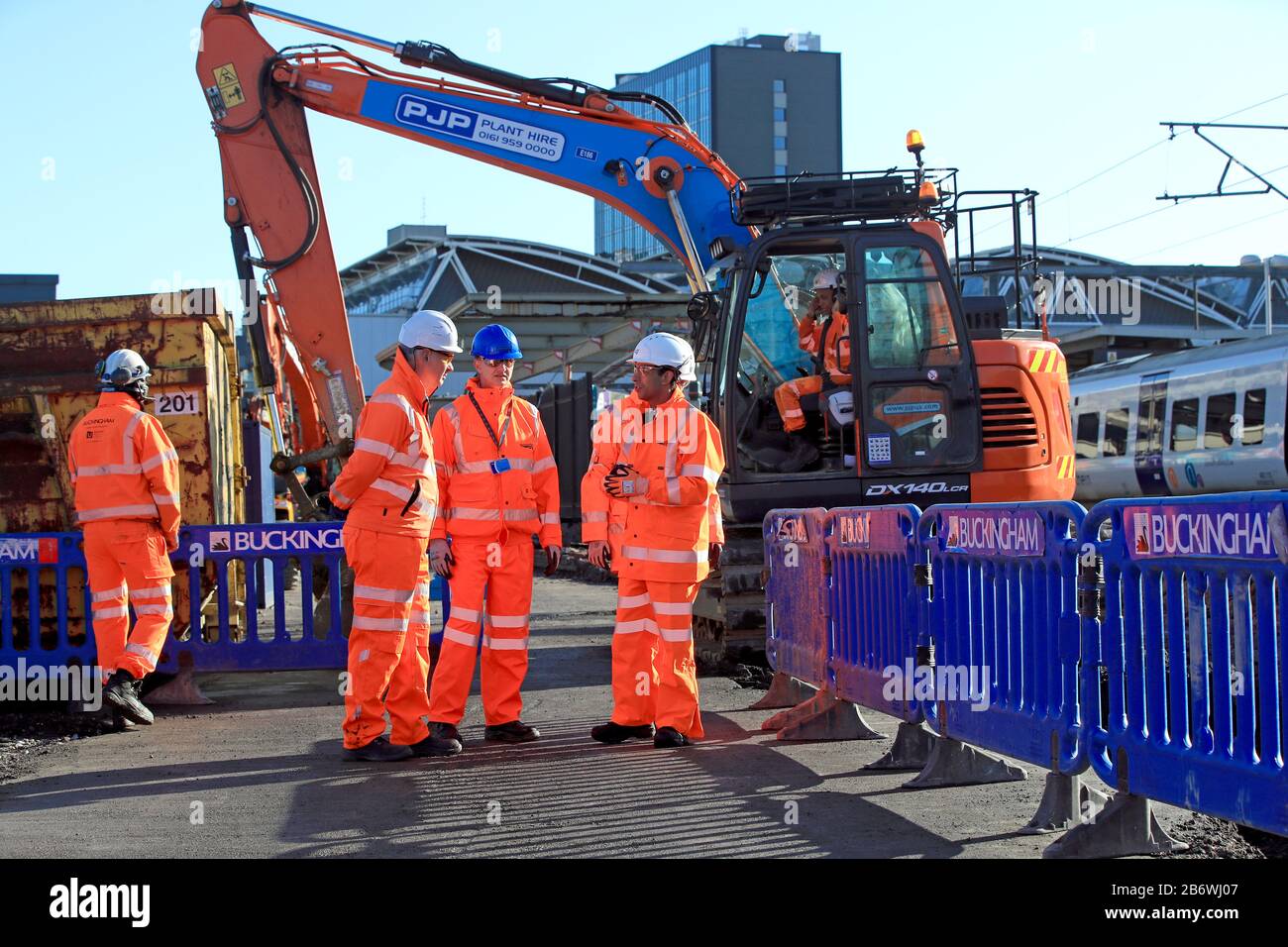 Chancellor Rishi Sunak (right) with Network Rail staff Rob Mcintosh ...