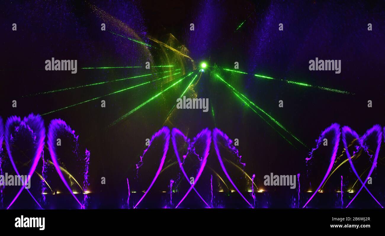 Colorful water fountains. Beautiful laser and fountains show. Large ...