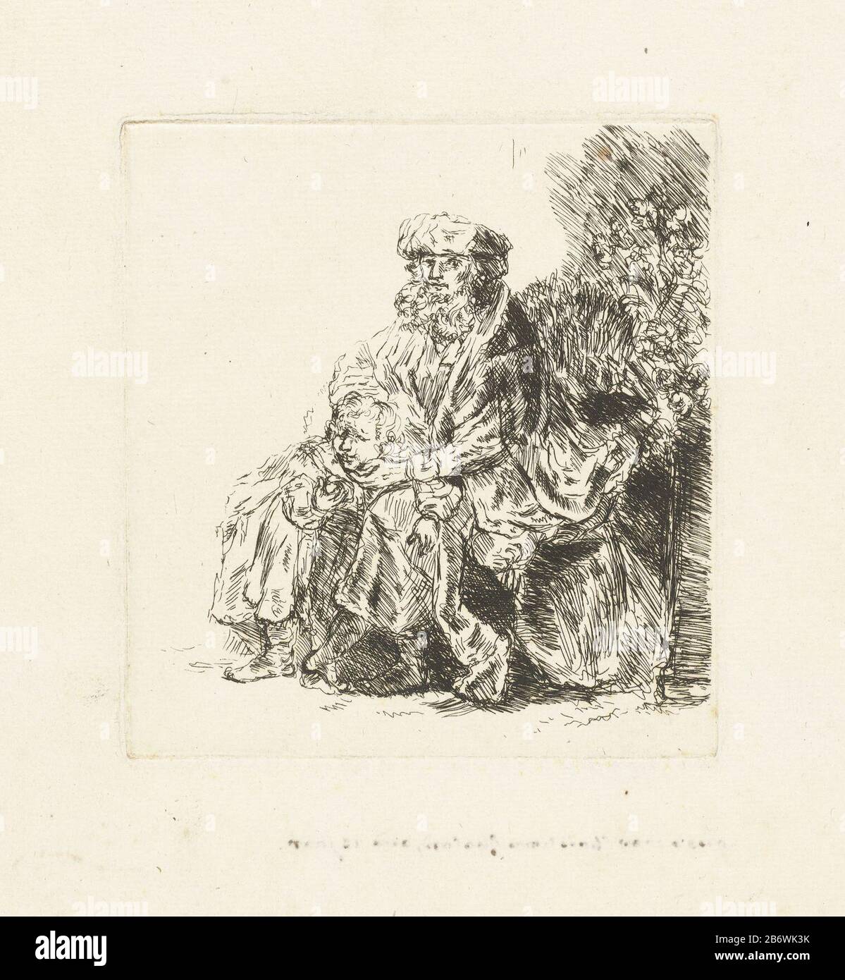 Jacob en Benjamin Jacob sits in a chair and holding his youngest son ...