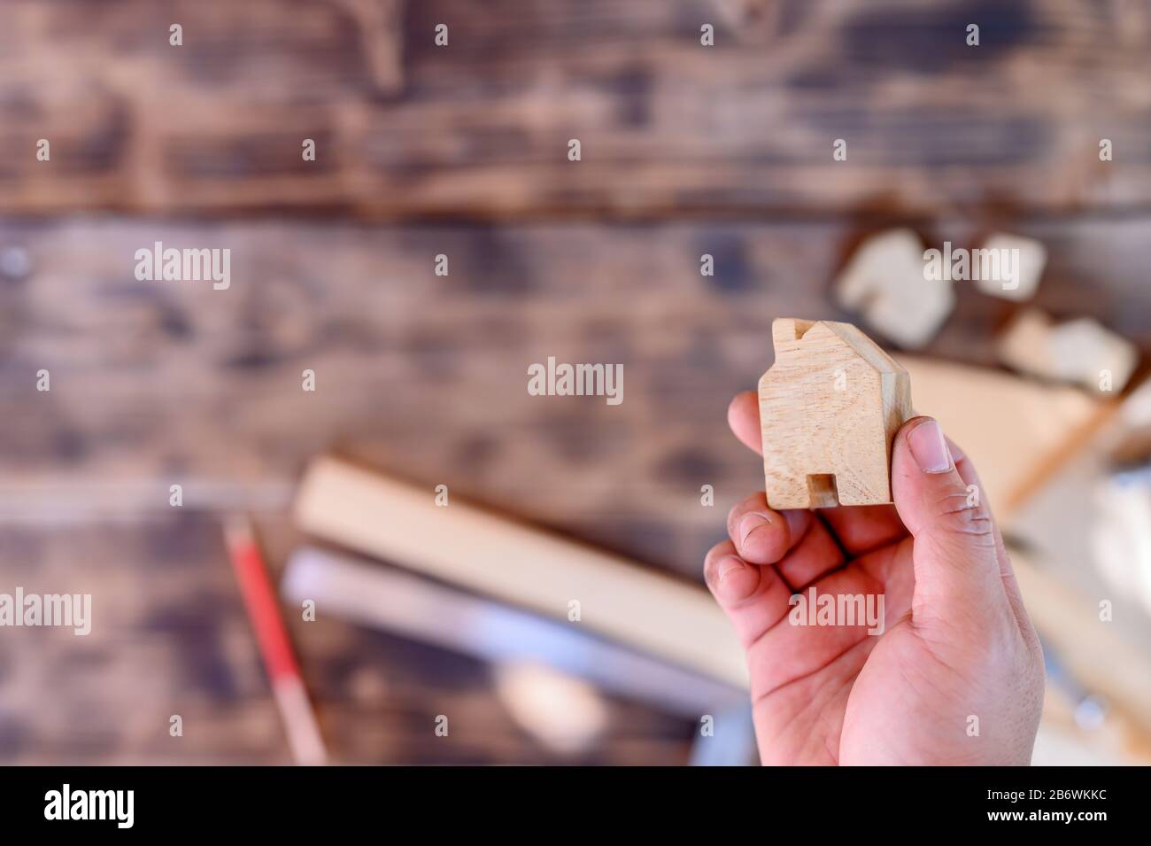 Carpenter working in carpentry shop. Woodwork for furniture and home ...