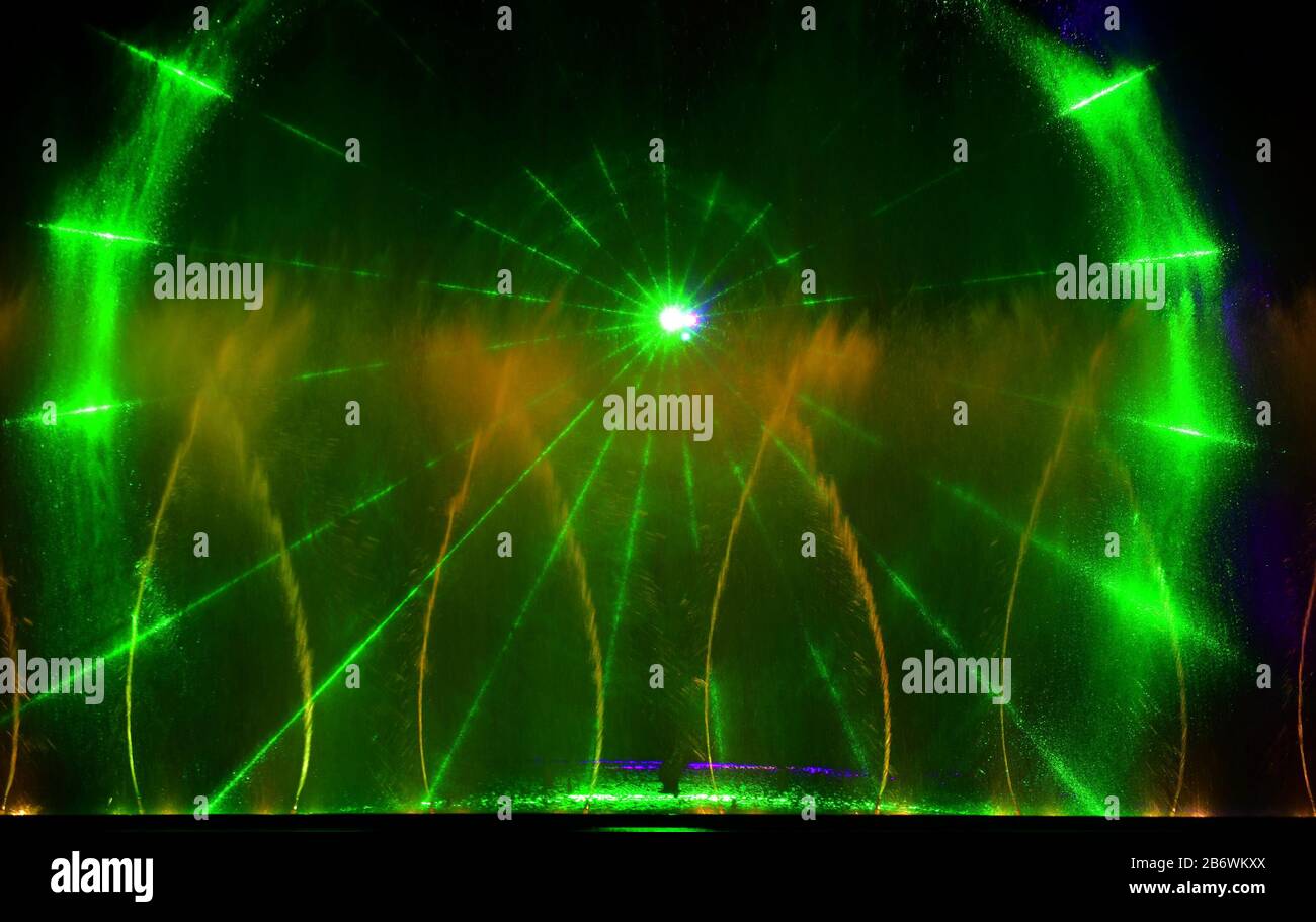 Colorful water fountains. Beautiful laser and fountains show. Large ...
