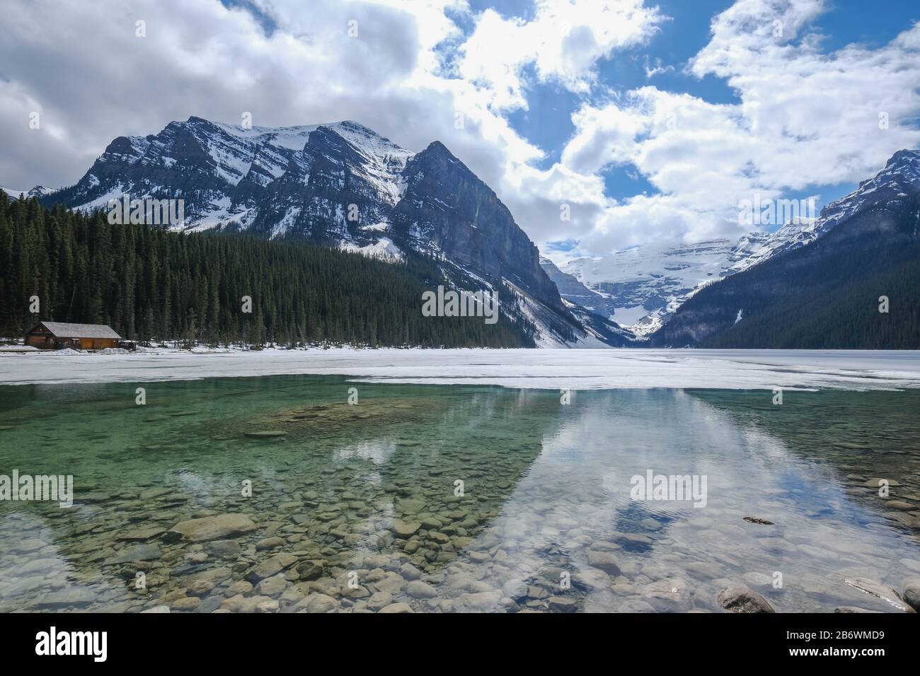 Mount fairview, partly frozen lake, Lake Louise Banff National Park ...