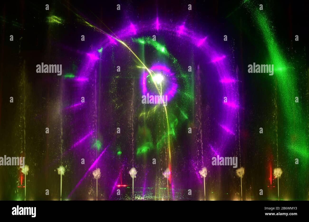 Colorful water fountains. Beautiful laser and fountains show. Large ...