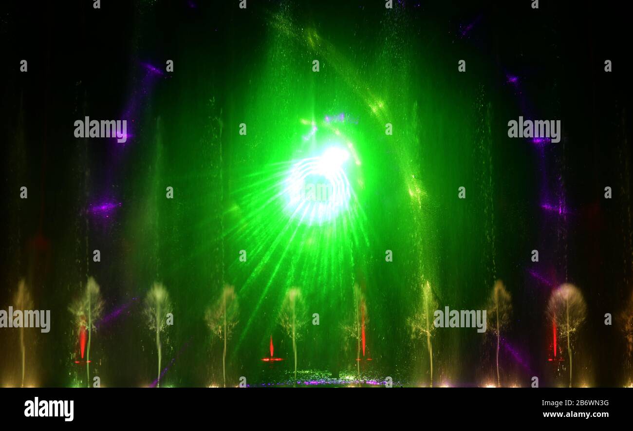 Colorful water fountains. Beautiful laser and fountains show. Large ...