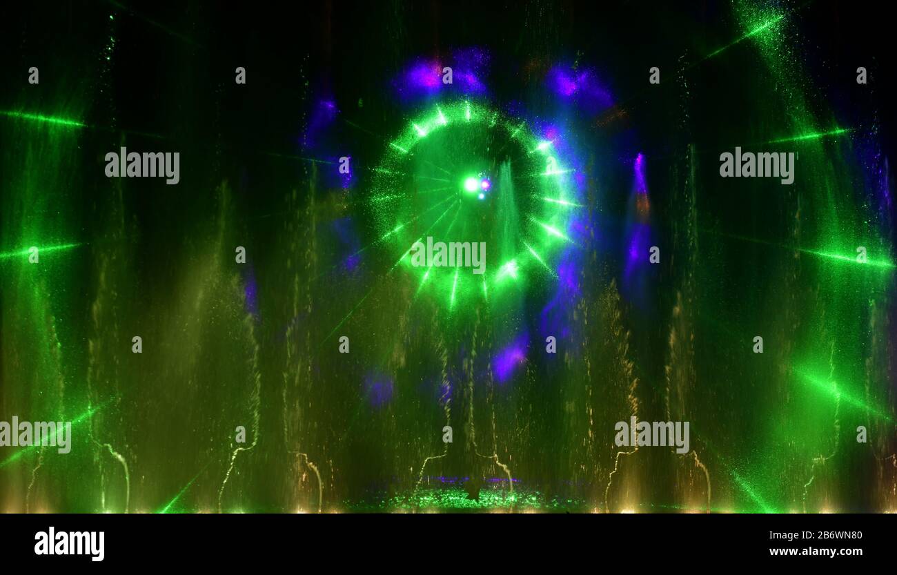 Colorful water fountains. Beautiful laser and fountains show. Large ...